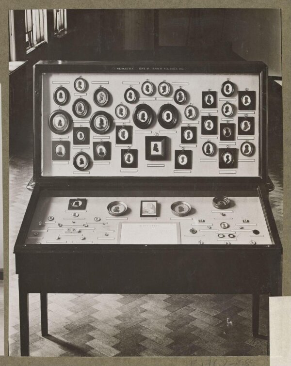 Victoria and Albert Museum, Display case and desk case of silhouettes ...