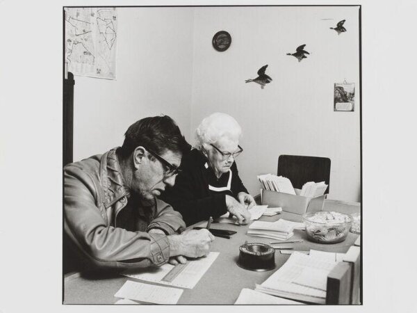 Workers of the Progressive Federal Party checking voters rolls ...