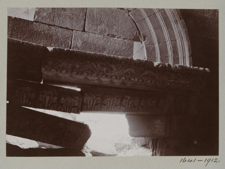 Detail of carved lintel and arch of the east door of the temple in the ...