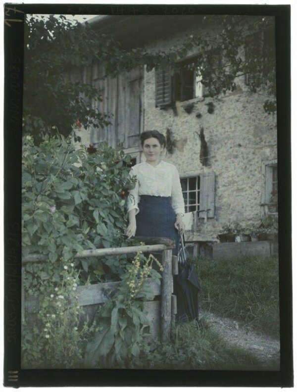 A close-up of Else in front of the farmhouse at Attersee, Austria ...